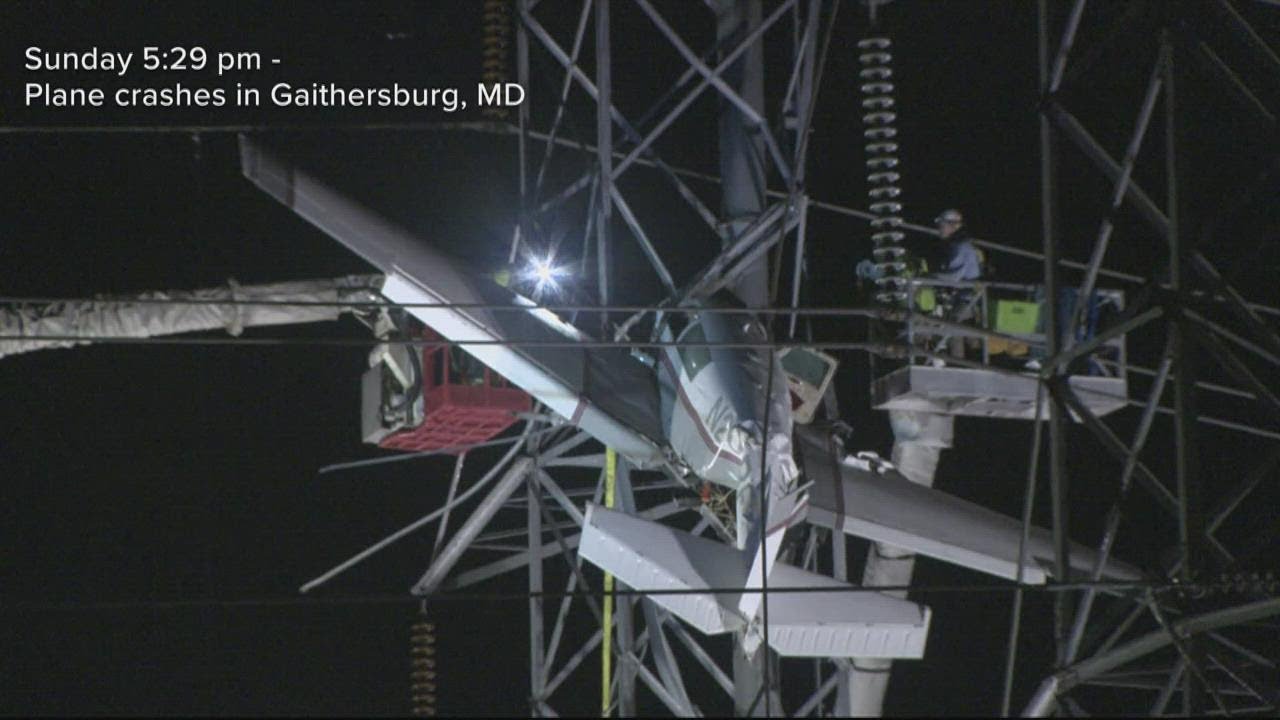 Crews rescue 2 from plane caught in power lines in Maryland - YouTube