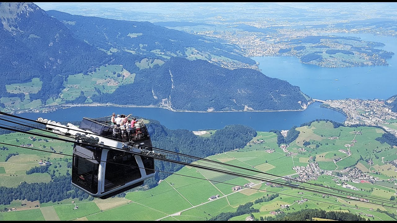 The world’s first double deck cable car with an open upper deck - YouTube