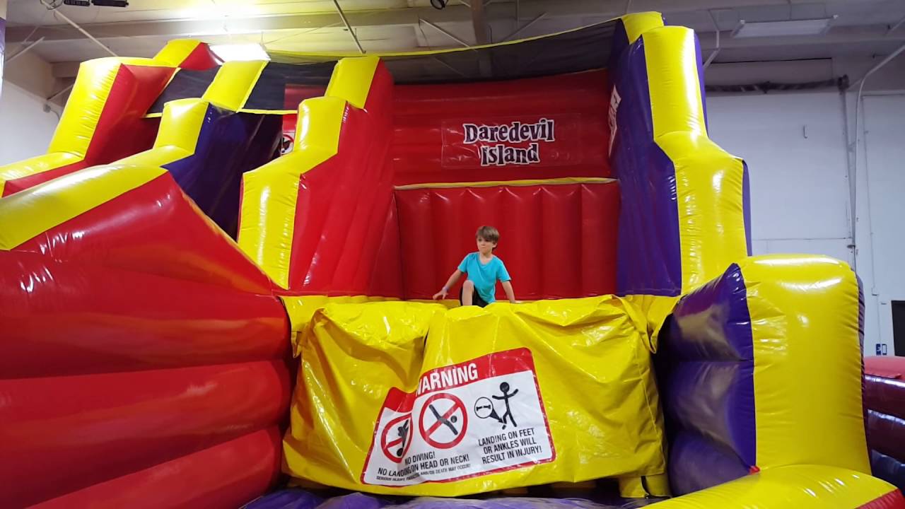 Bryce jumping from daredevil island at bounce u - YouTube