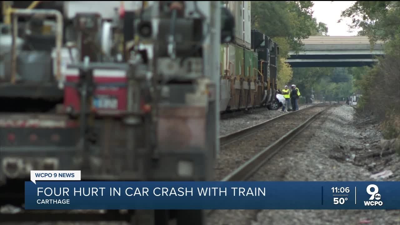 4 hospitalized after train hits car in Cincinnati - YouTube