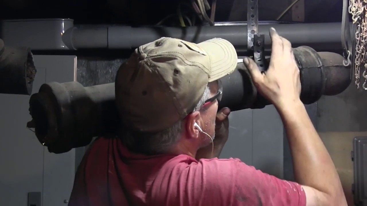 Removing Cast Iron Pipe ... Hand Saw - YouTube