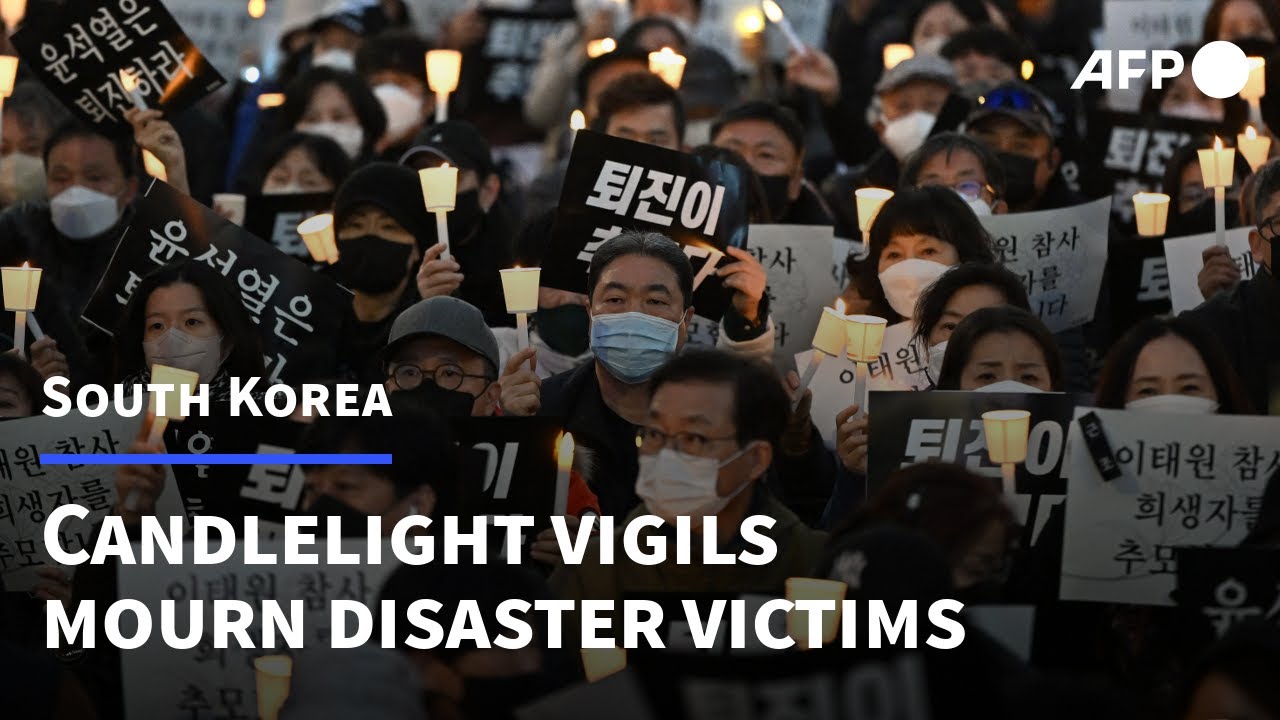 Candlelight vigils mourn South Korea Halloween disaster victims | AFP ...