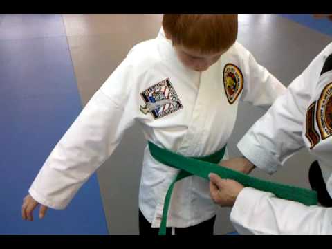 How To Tie A Belt On Someone Else - YouTube