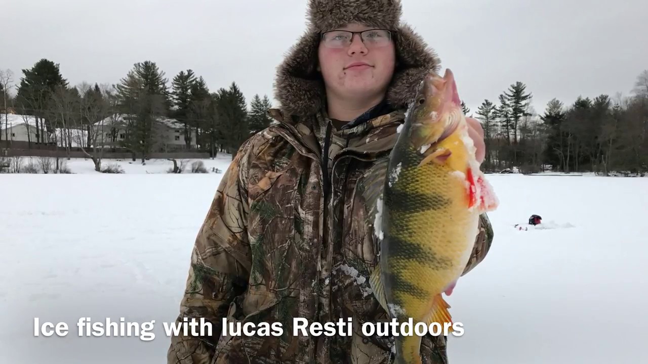 Ice fishing giant perch 4k video - YouTube
