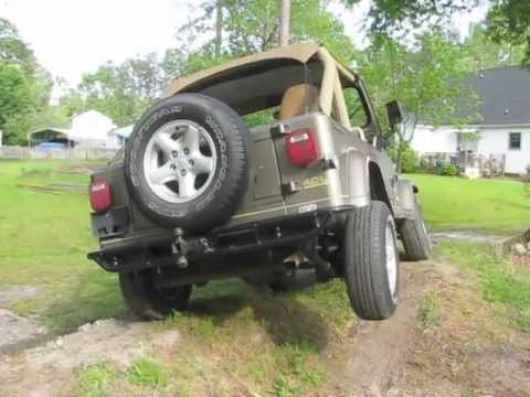 '91 Jeep Wrangler YJ (bone stock suspension flex/articulation?) - YouTube