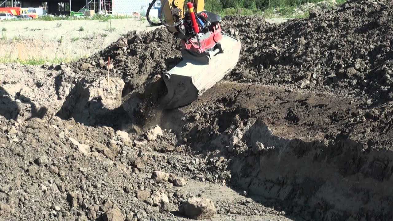 Rototilt: CAT 329E with tiltrotator - YouTube