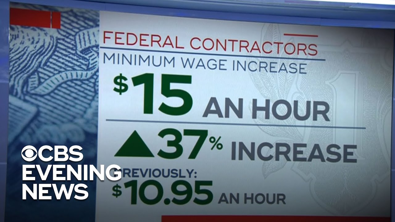 Biden raises minimum wage for federal contractors - YouTube