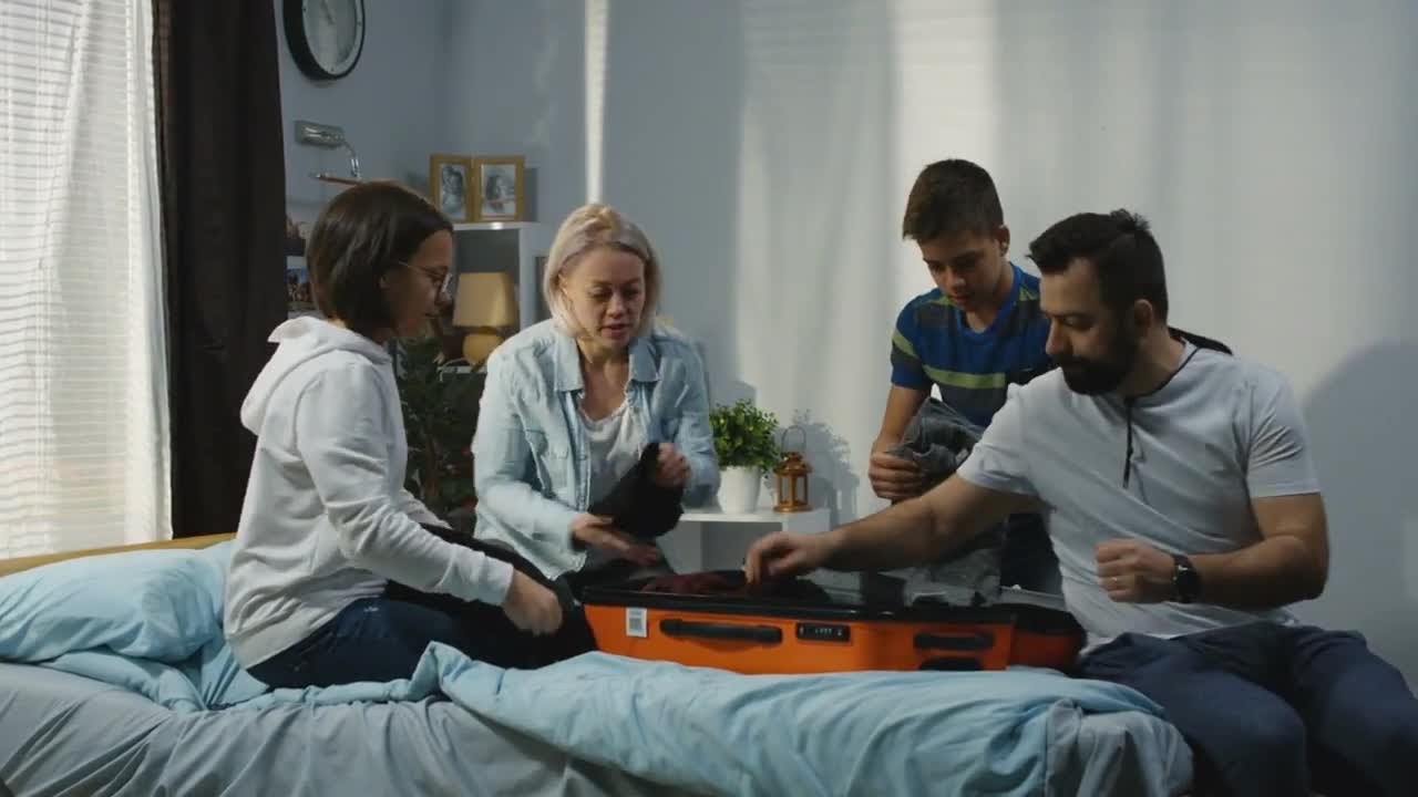 Family Packing Stock Video - YouTube