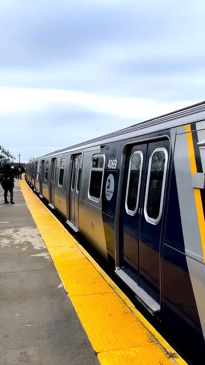 Inwood-207 St bound 2021 Kawasaki R211A (A) train arriving at B 25 St-Wavecrest (Credit to ...