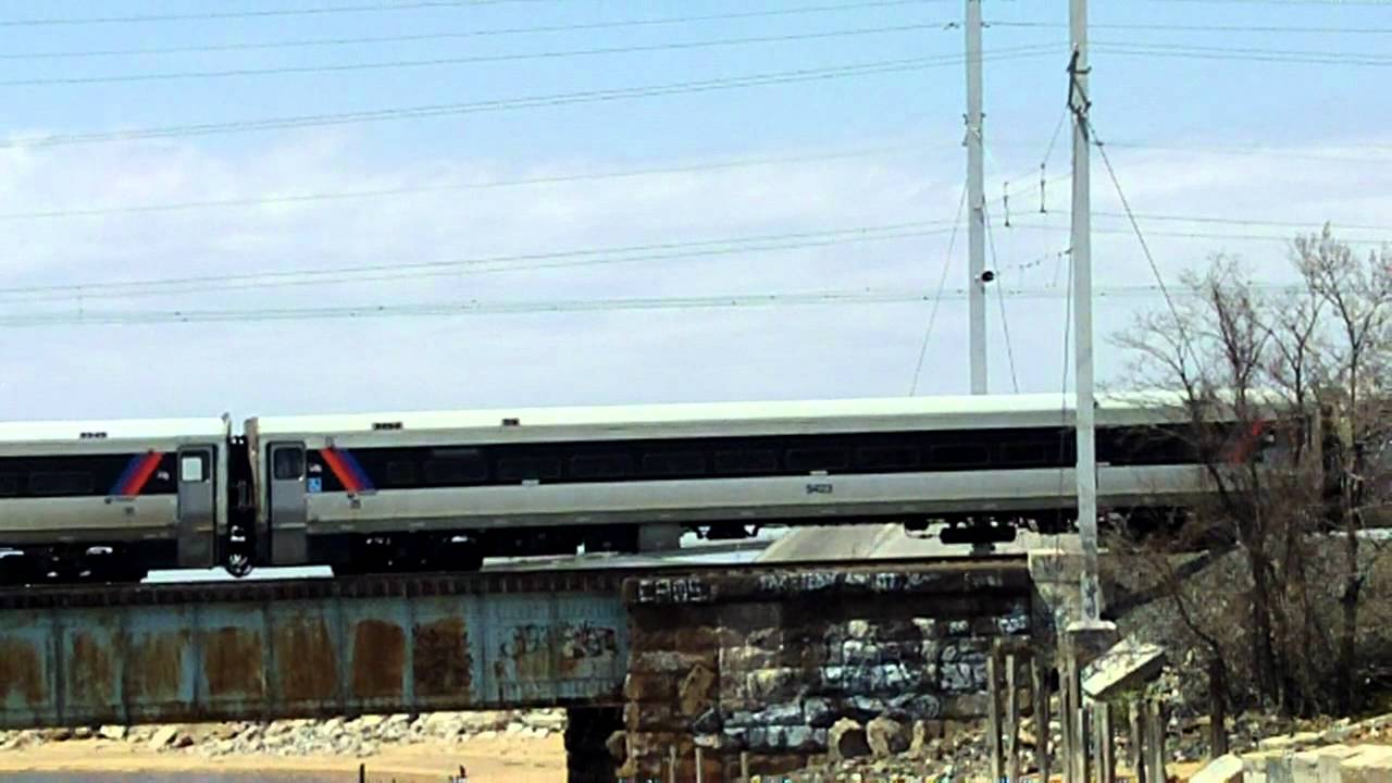 alp 46 leads njt train over a river - YouTube