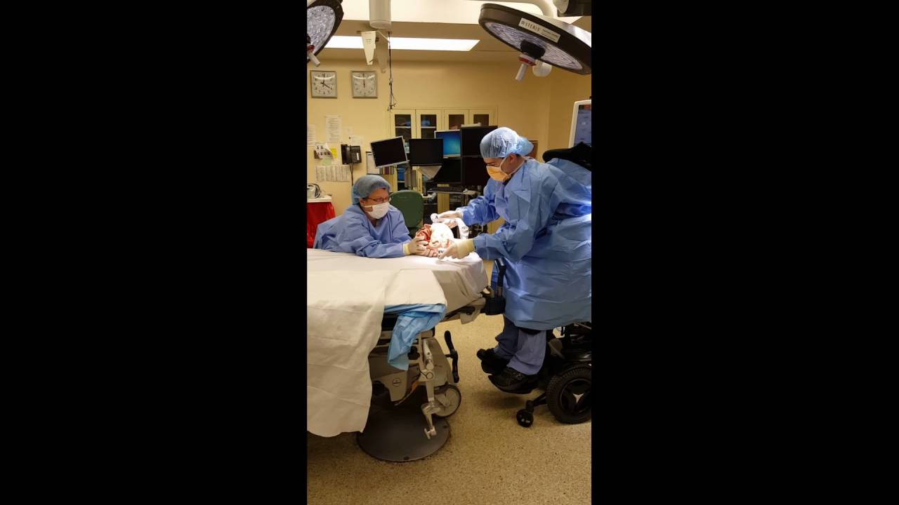 Demonstration of mayfield application and patient flip with head ...