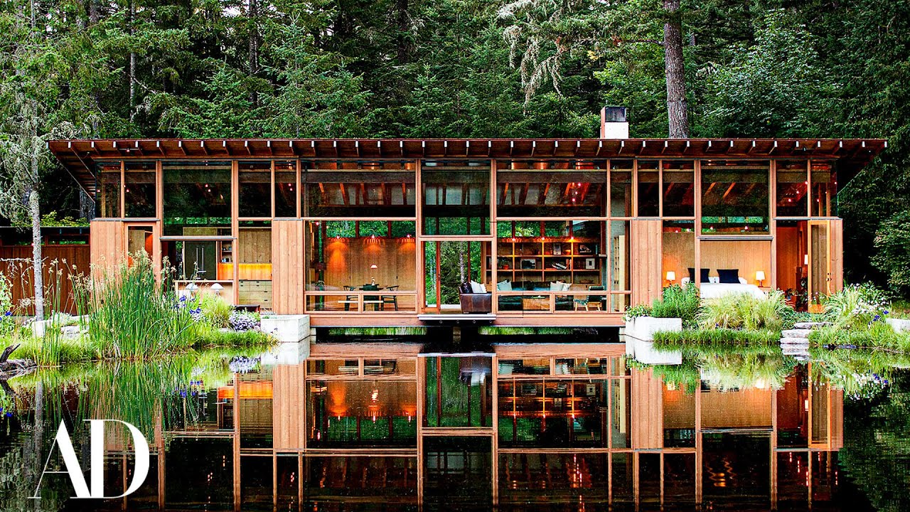 Inside a Woodland Home Built Over Water to Become One With Nature ...