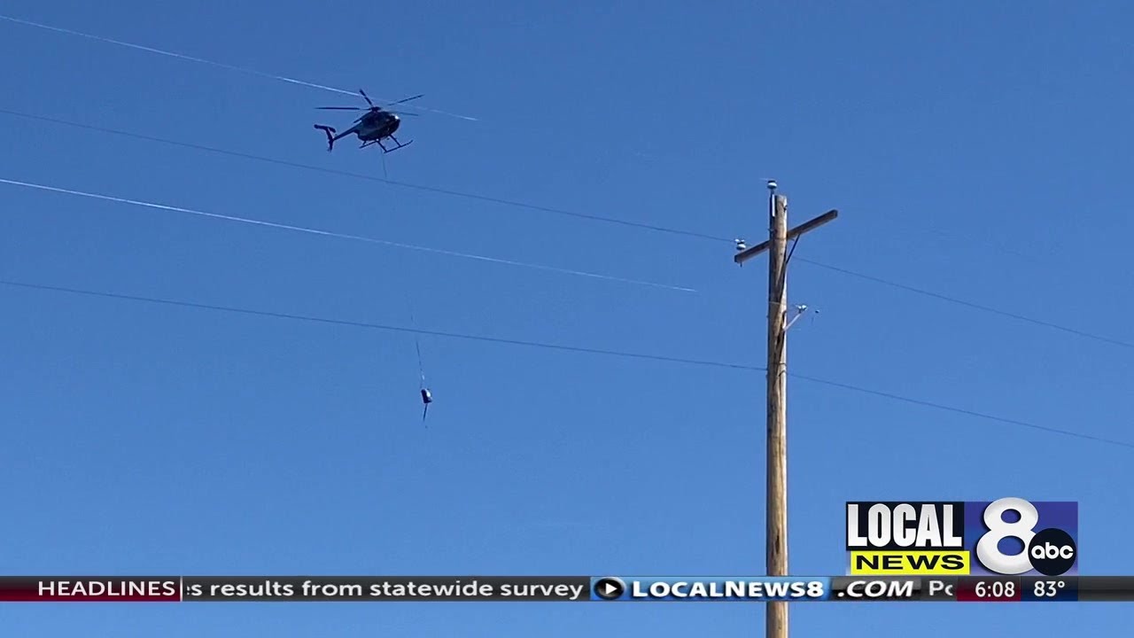 Helicopter used to install power lines - YouTube