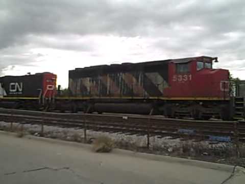 CN SD40-2W & GTW GP38-2 Begin Pulling Their Train - YouTube