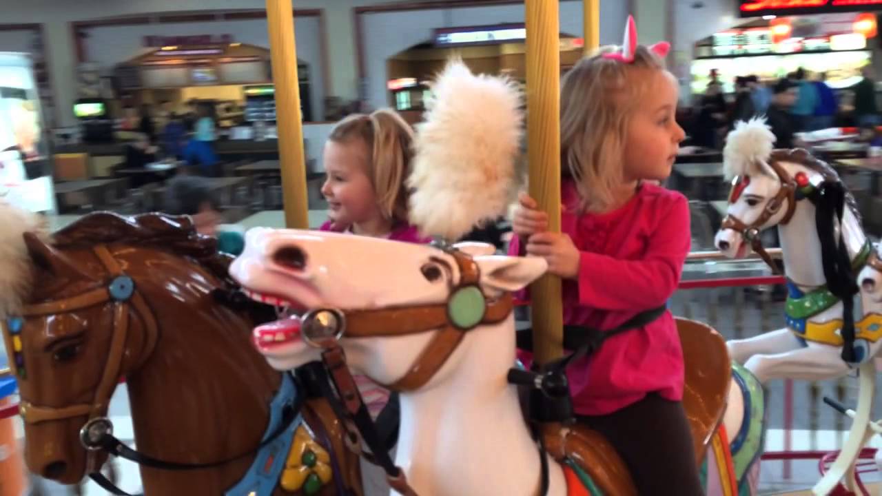 The girls riding a carousel - YouTube