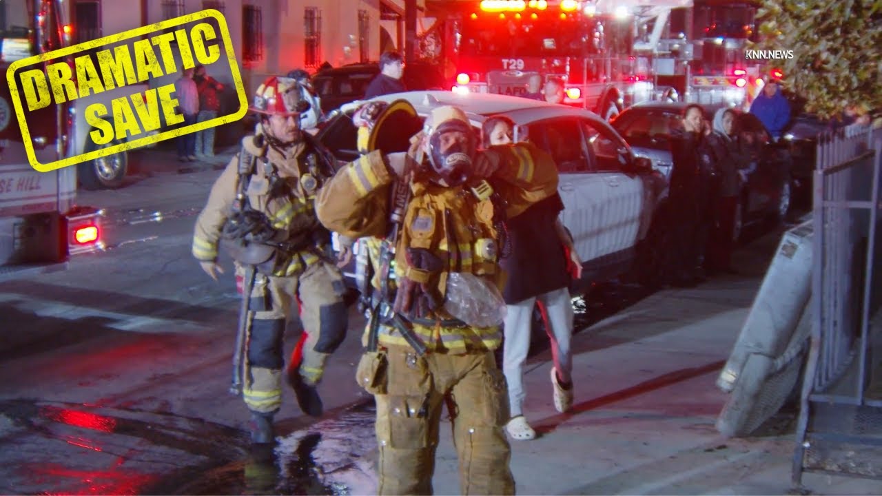 LAFD Rescues Woman & Child From Fire - YouTube