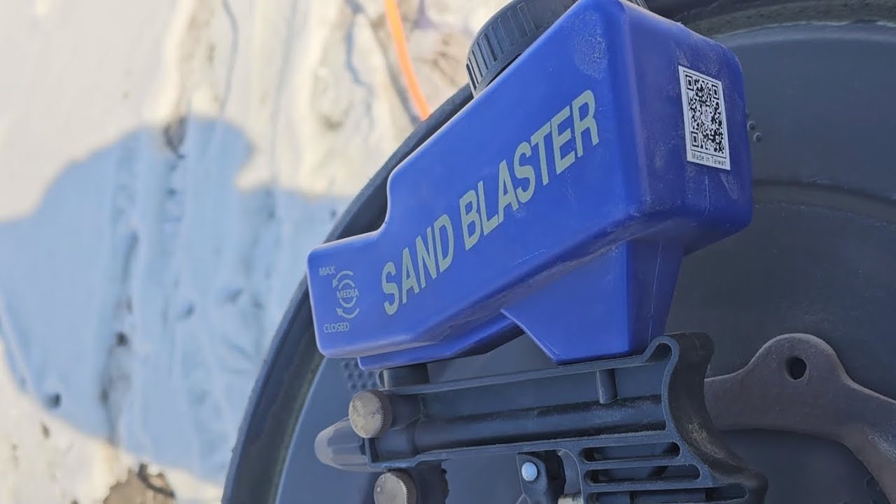Sand blasting an old stove - YouTube