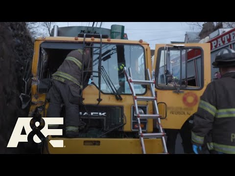 Live Rescue: Trapped in a Trash Truck (Season 3) | A&E
