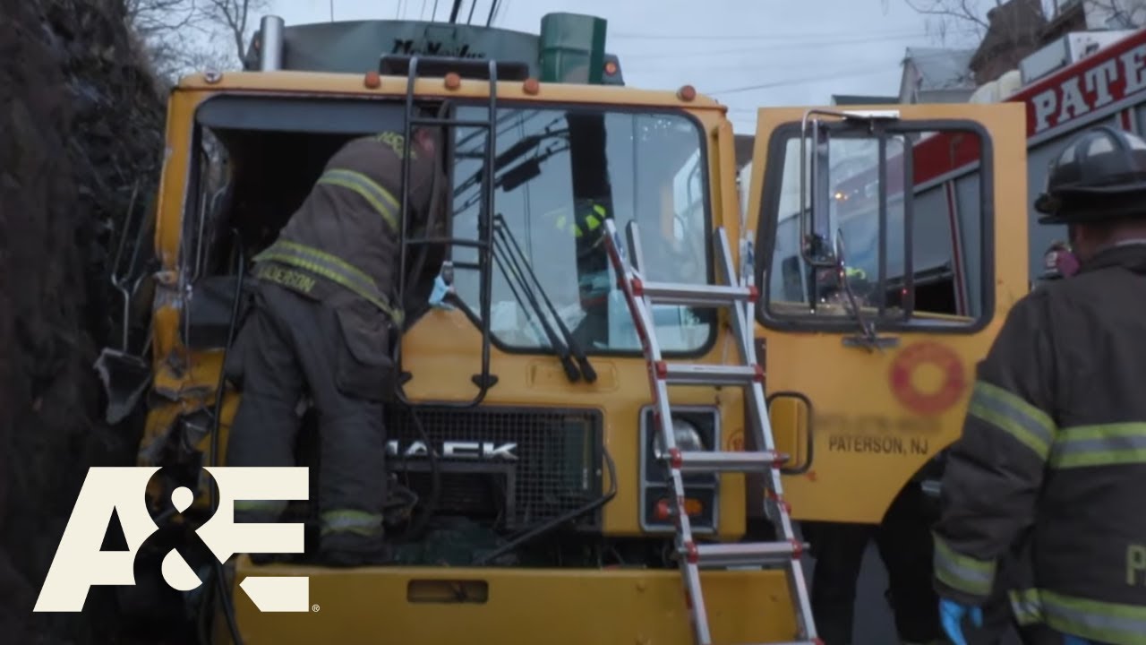Live Rescue: Trapped in a Trash Truck (Season 3) | A&E - YouTube