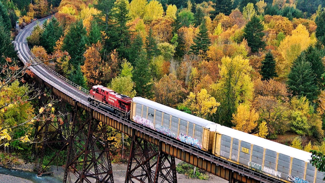 CP Double Stack with Autoracks Crosses Long Curved Bridge In Autumn ...