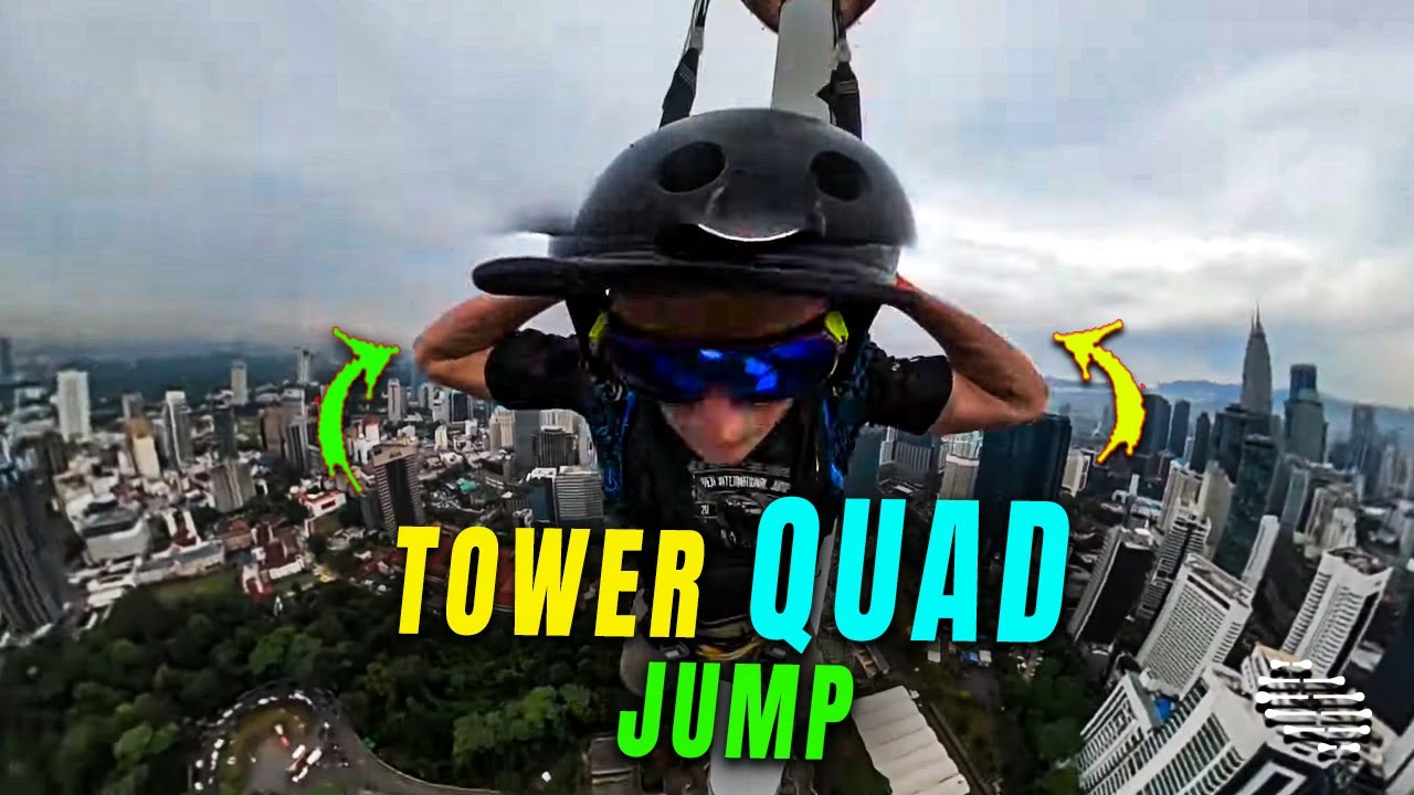 Guy Base Jumps off of a Tower While Doing a Quad Flip - YouTube