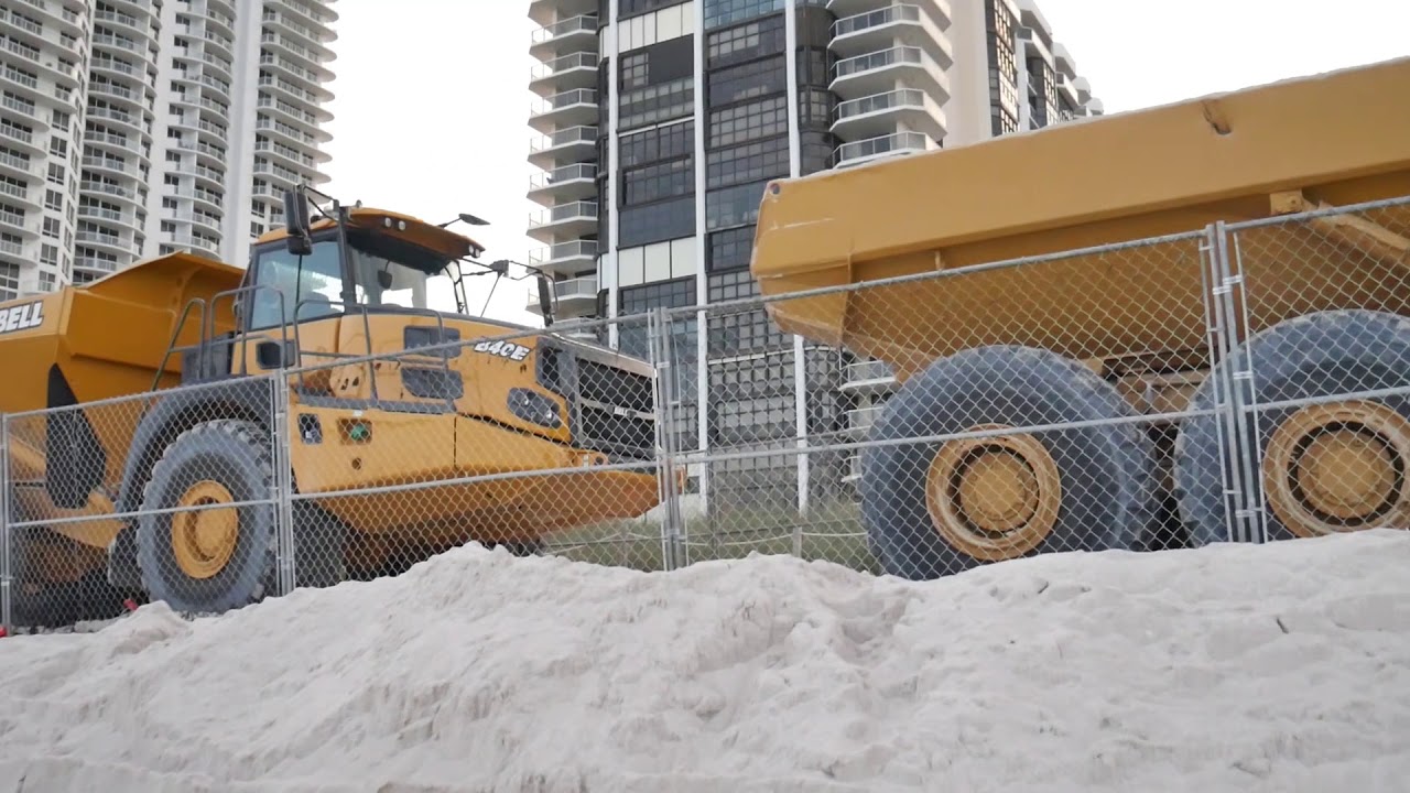 Miami Beach is dumping sand on the shores to fight sea level rise - YouTube