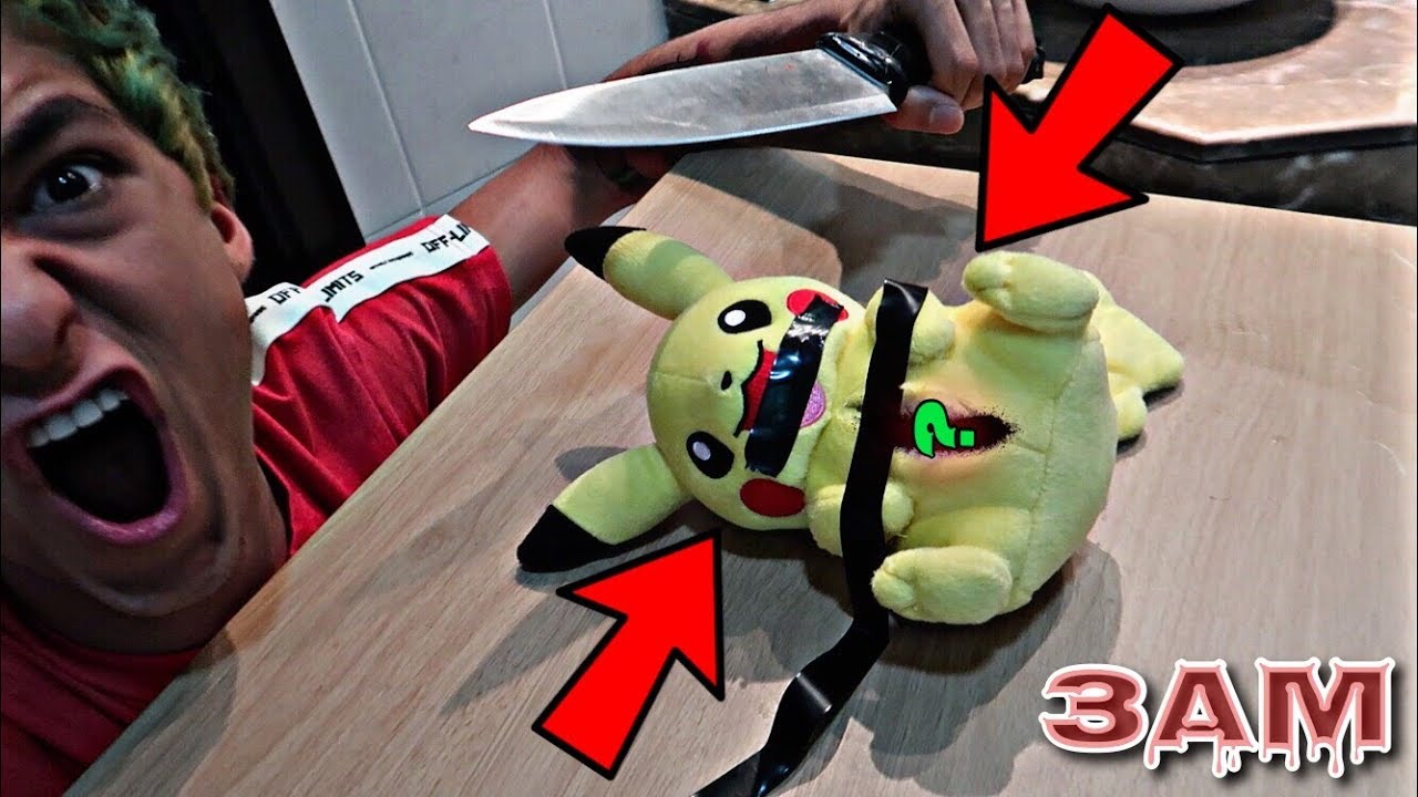 DO NOT CUT OPEN HAUNTED PIKACHU DOLL AT 3AM!! *OMG WHAT'S INSIDE ...