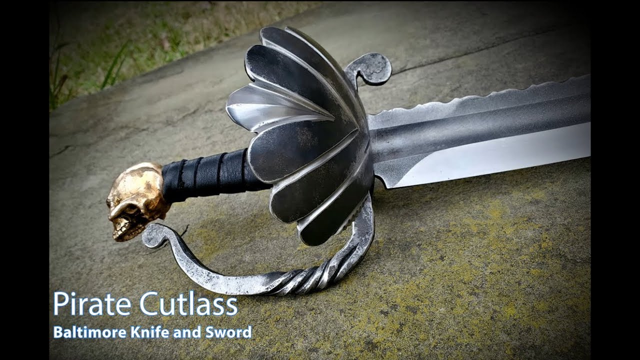 Pirate sword custom with bronze skull pommel and clam shell - YouTube