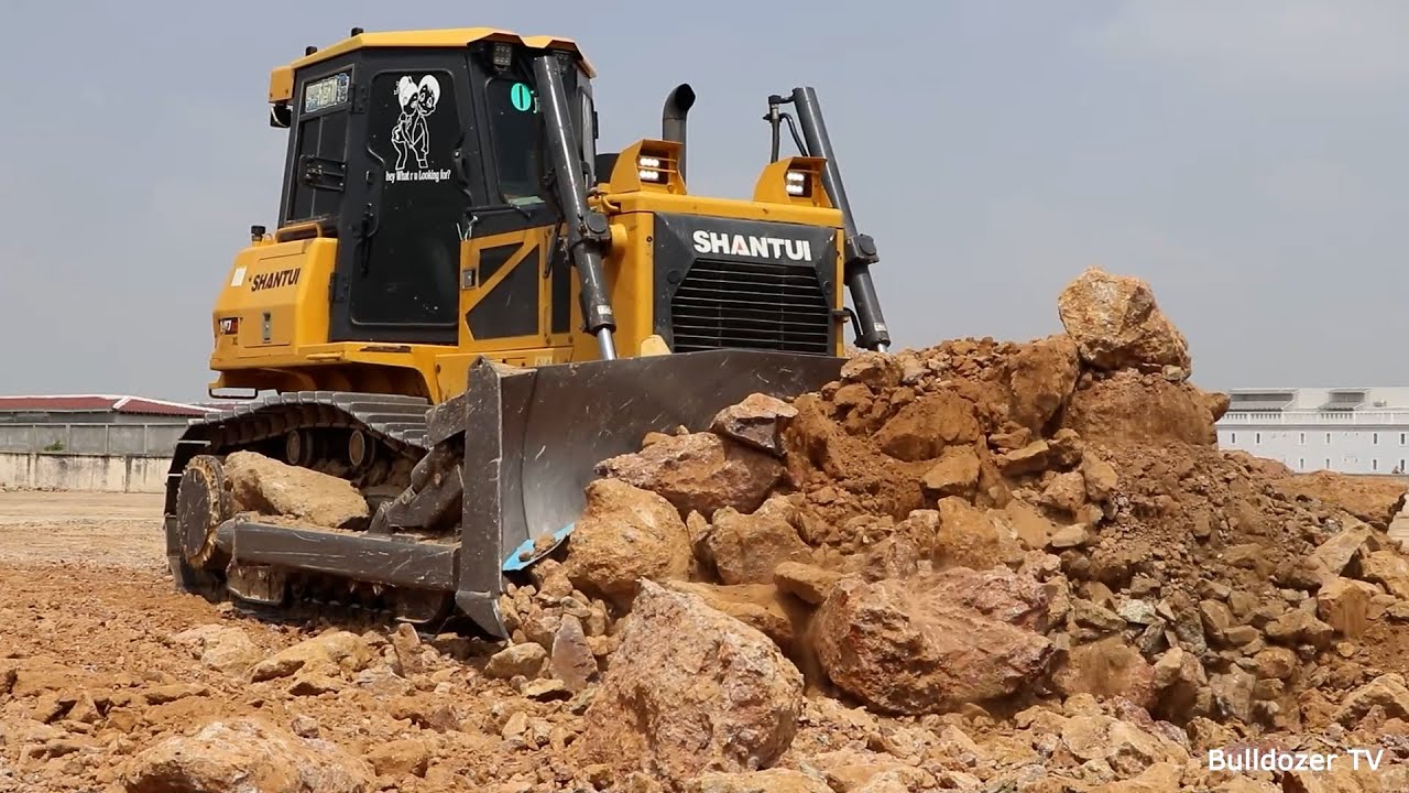 Show Wonderful Stronger SHANTUI Heavy Bulldozer Pushing Rocks On The ...