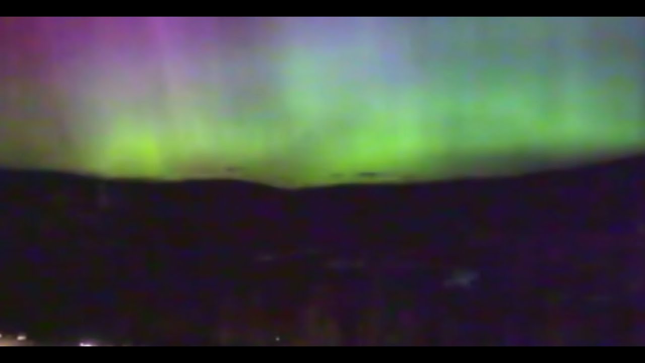 crazy aurora borealis at Yellowstone with geysers & starlink - YouTube