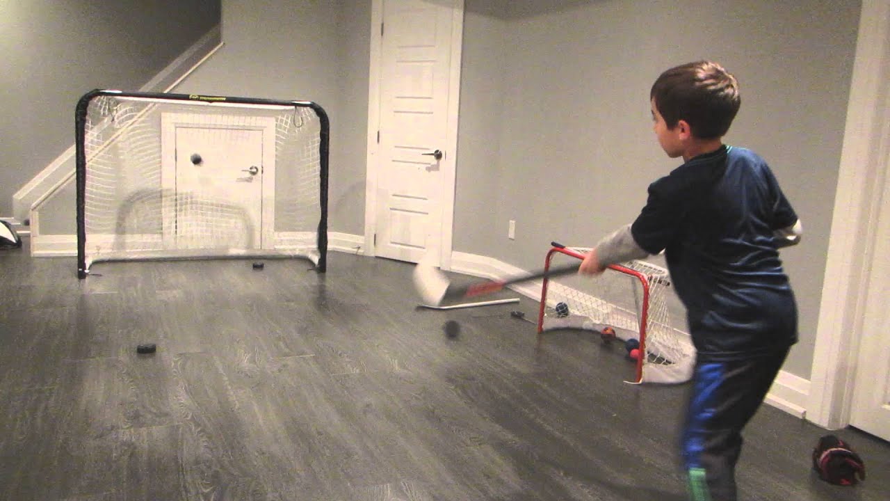Shooting pucks - YouTube