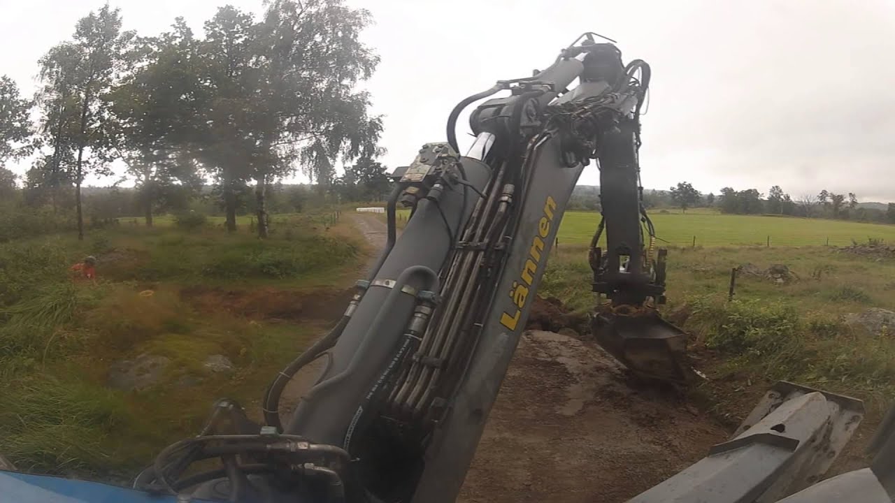 Backhoe backfilling - YouTube
