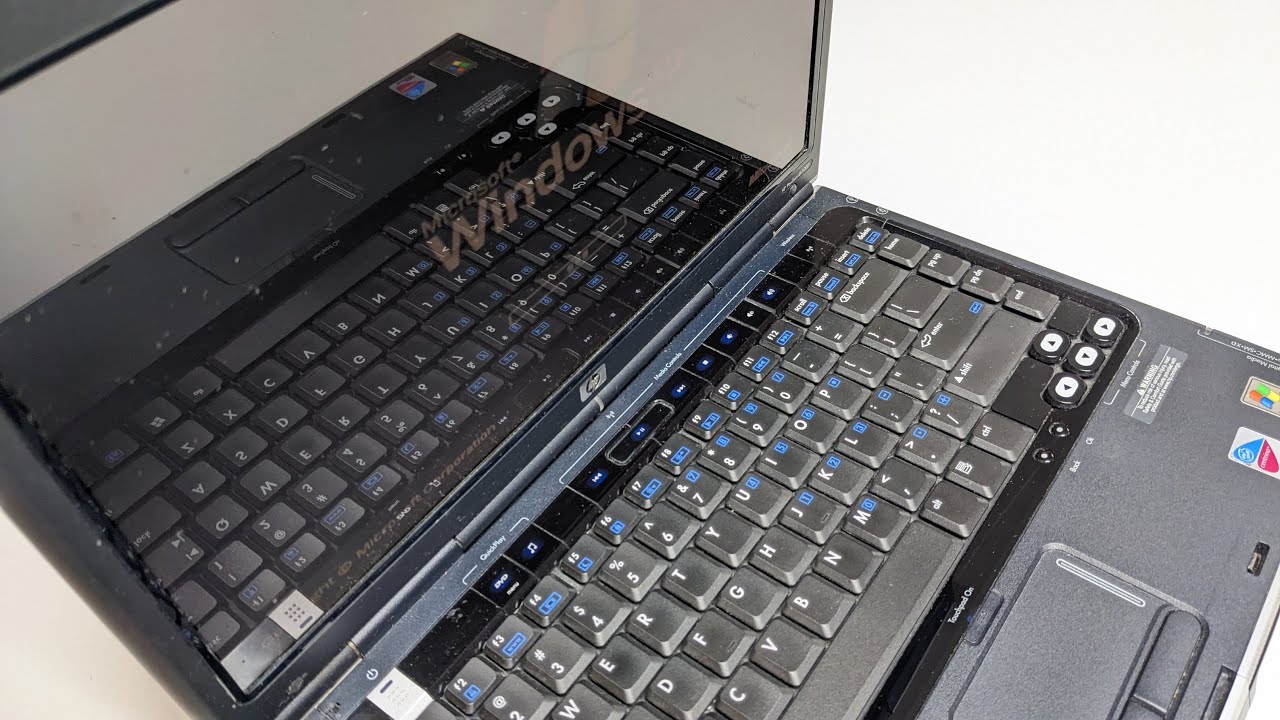 Windows XP Gaming on a HP DV1000 - YouTube