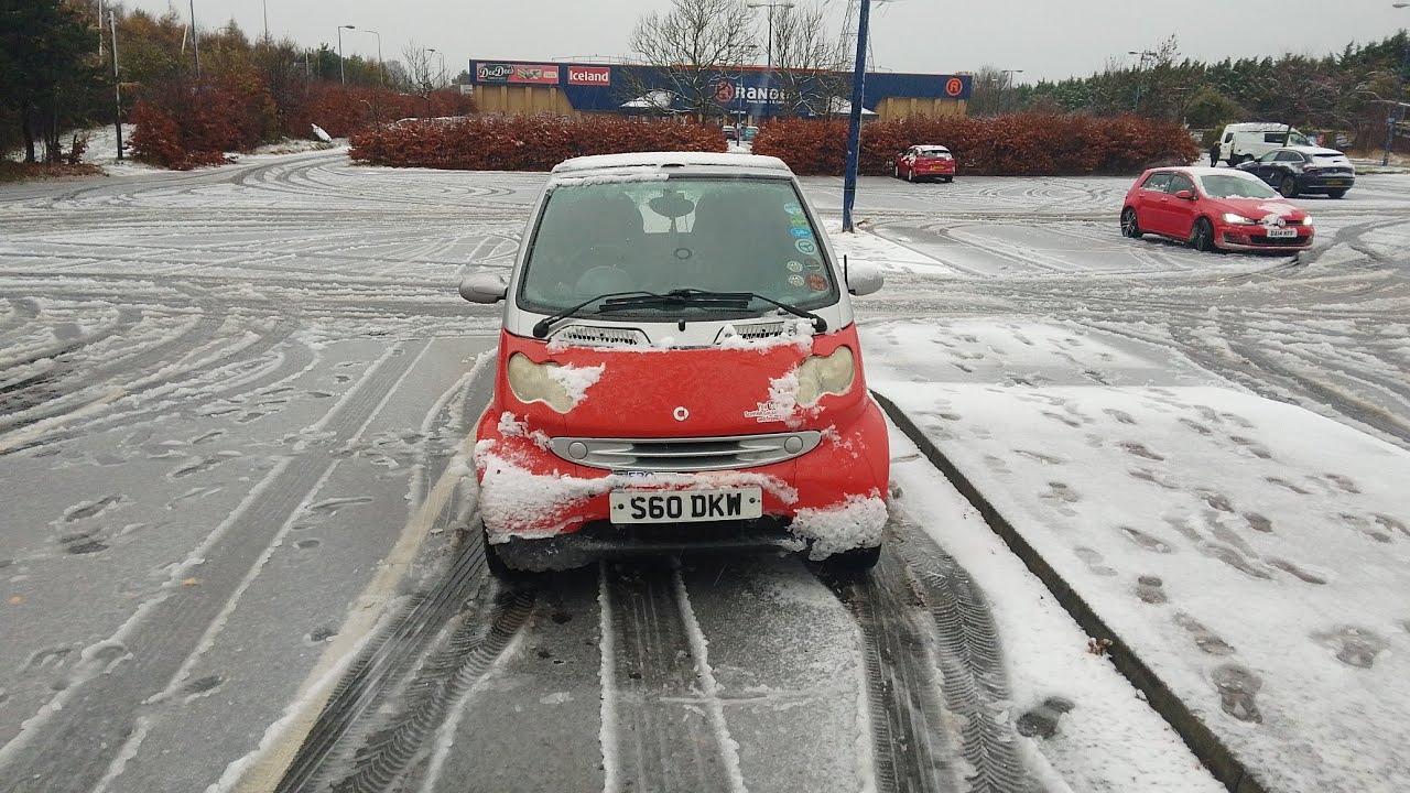 My Seven Year Old's Reaction as we drive into a snowy/slushy Car Park ...