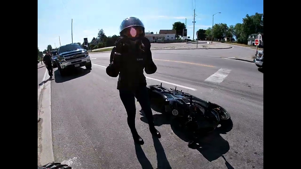 She dropped her motorcycle... - YouTube