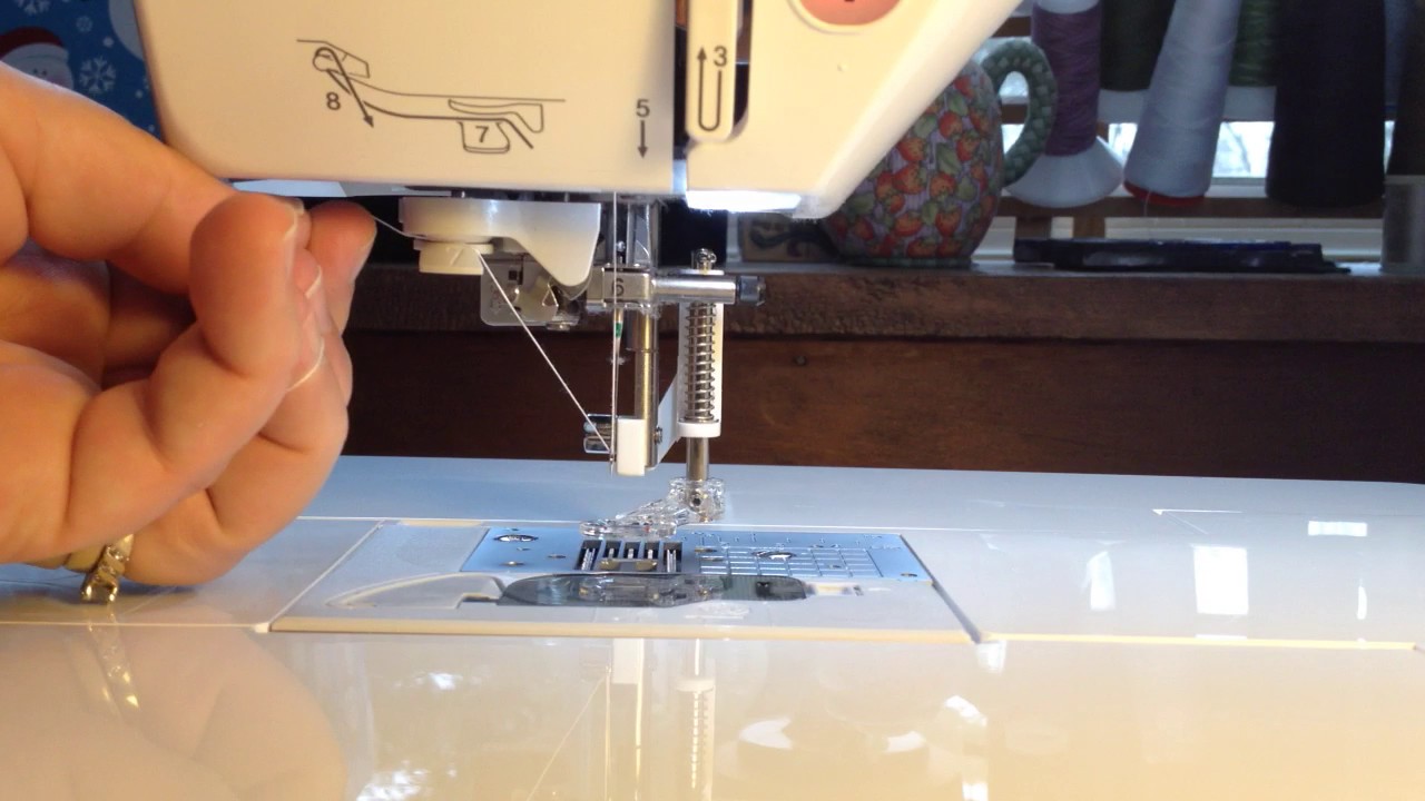 Using the automatic needle threader on the Brother NQ900 sewing machine ...