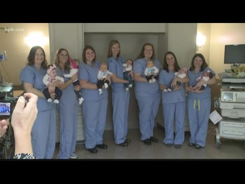 Nurses who were pregnant at same time hold their babies in adorable photo