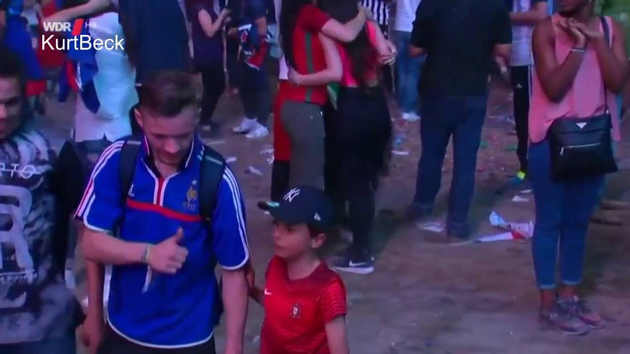 EM 2016: Portuguese boy hugs crying French fan - YouTube
