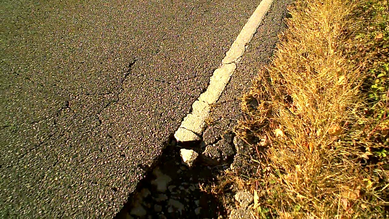 this broken road needs fixing... - YouTube