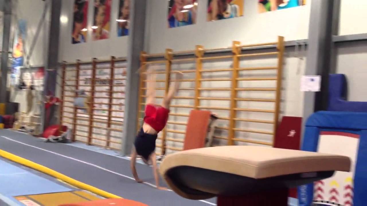 round off backhandspring full twisting layout - YouTube