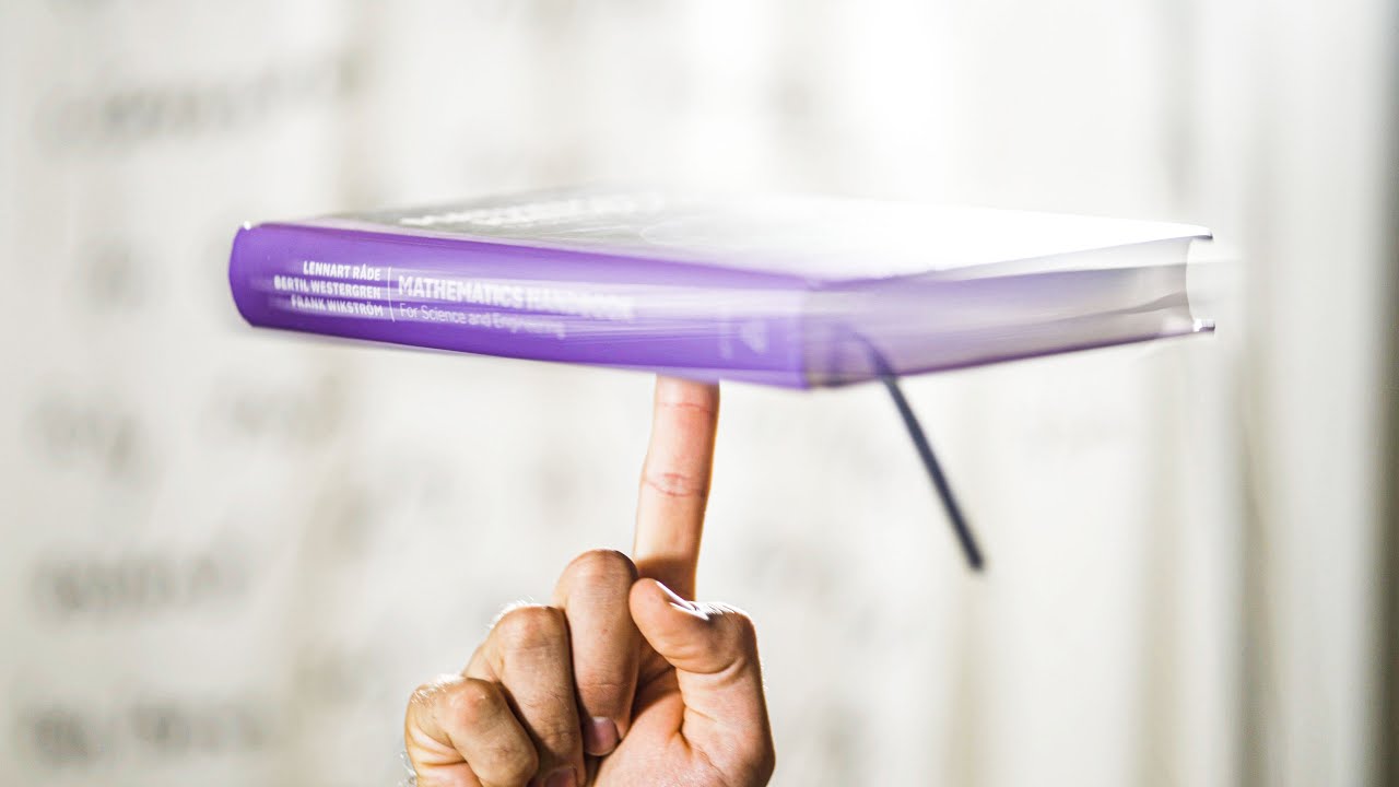 Learning how to spin books - YouTube