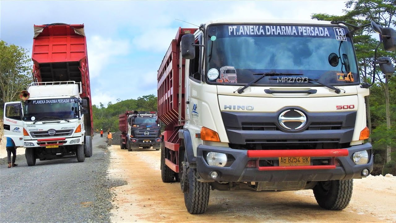 Aggregate Trucking Delivery To The New Road Construction Site - YouTube