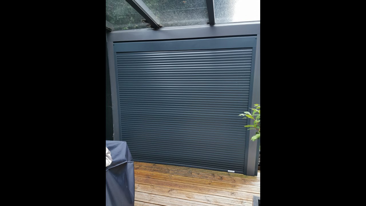Secure & Private Veranda with Solar Powered Roller Shutters: Supplied ...
