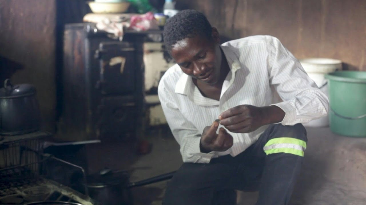 Zimbabwean 'Christmas beetle' makes a seasonal snack | AFP - YouTube