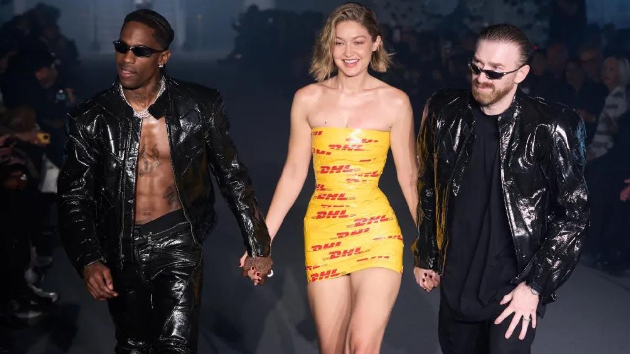 Gigi Hadid Dazzles in DHL Packing Tape Dress at Vetements Paris Fashion ...