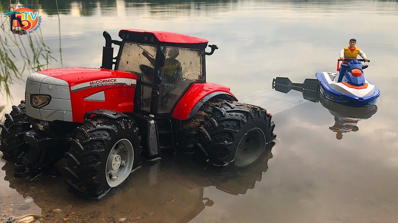 BRUDER TOYS TRAKTOR pulls mini trailer and Jet ski. #tractor - YouTube