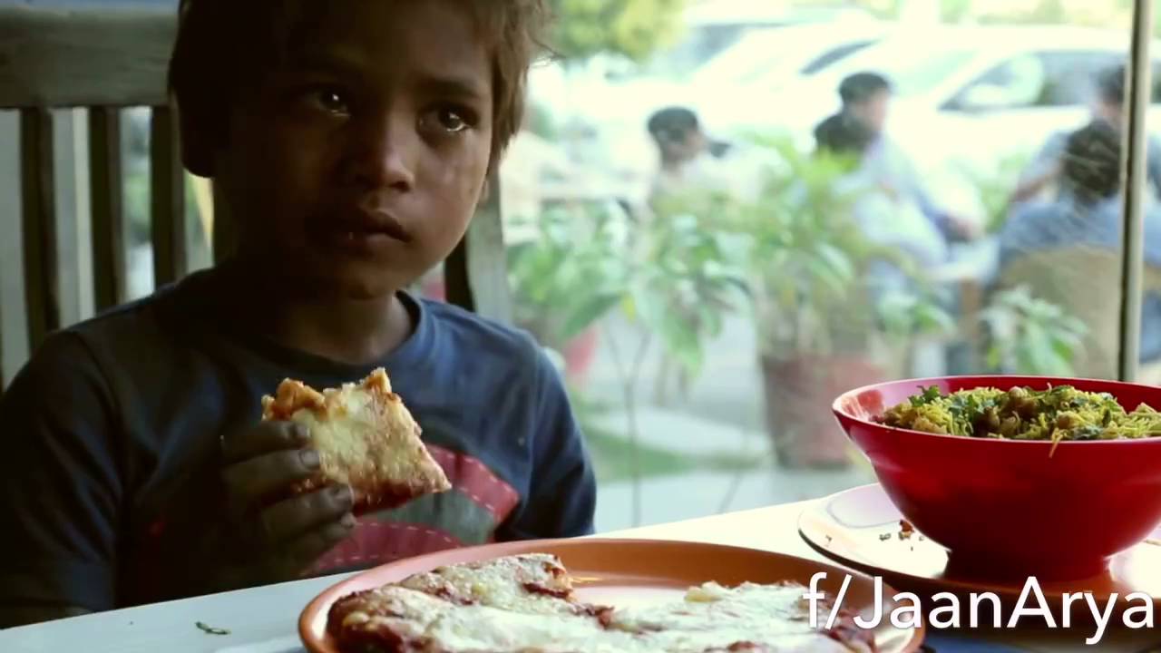A man was eating in the Restaurant and a Hungry poor kid was watching ...