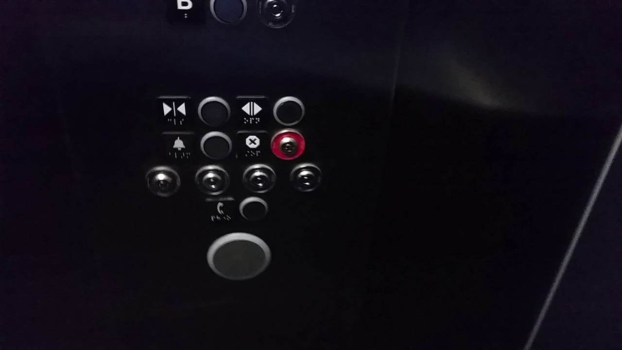 Ringing the alarm in a Kone Elevator - YouTube