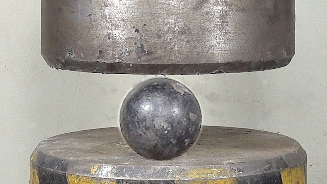 200 tons of hydraulic pressure, can crush the big iron ball? - YouTube
