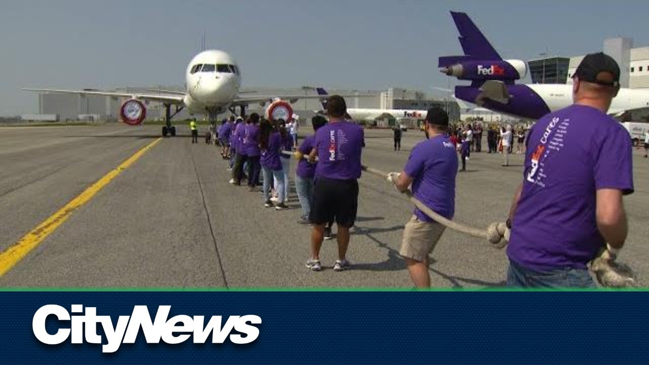 Plane pull for charity - YouTube